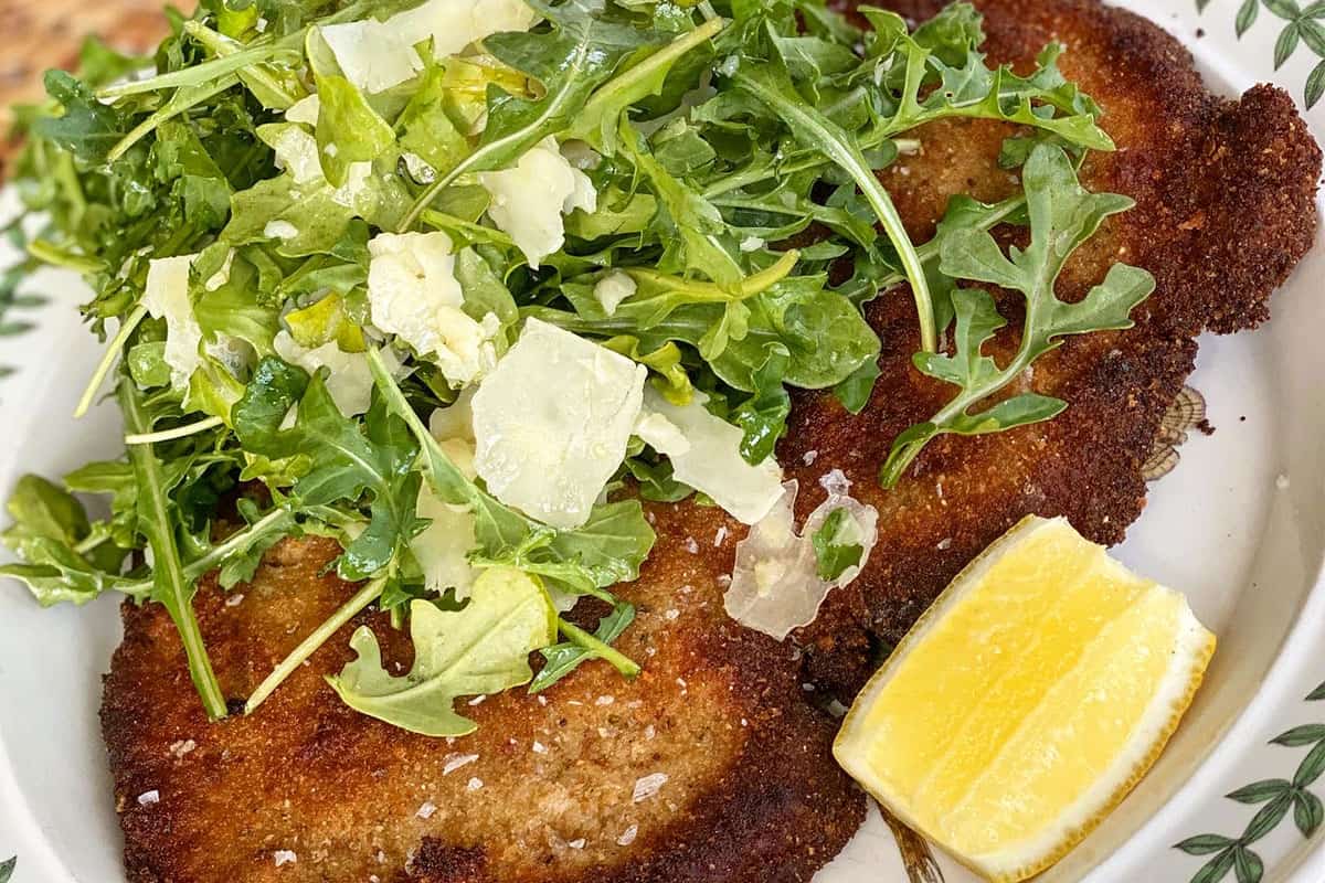 Crispy Pork With Lemon-Parmesan Arugula Salad Recipe | Prairie Fresh®